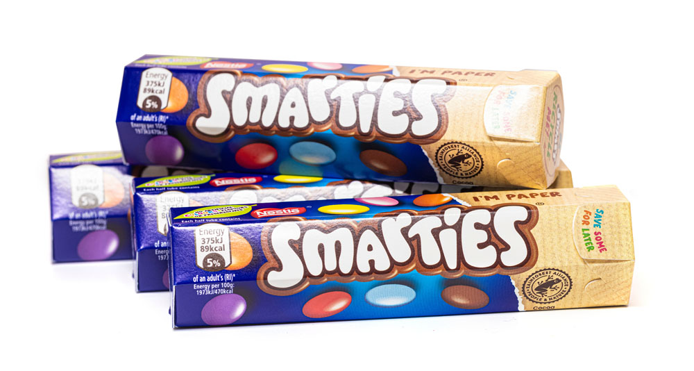 ubes of Smarties in the new 100% recyclable paper packaging ...